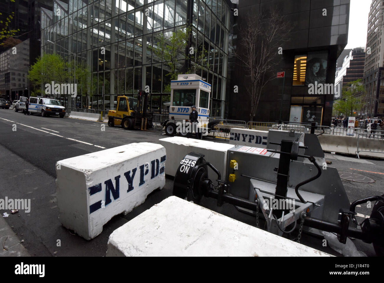 New York, United States. 20th Apr, 2017. A NYPD officers takes care of ...