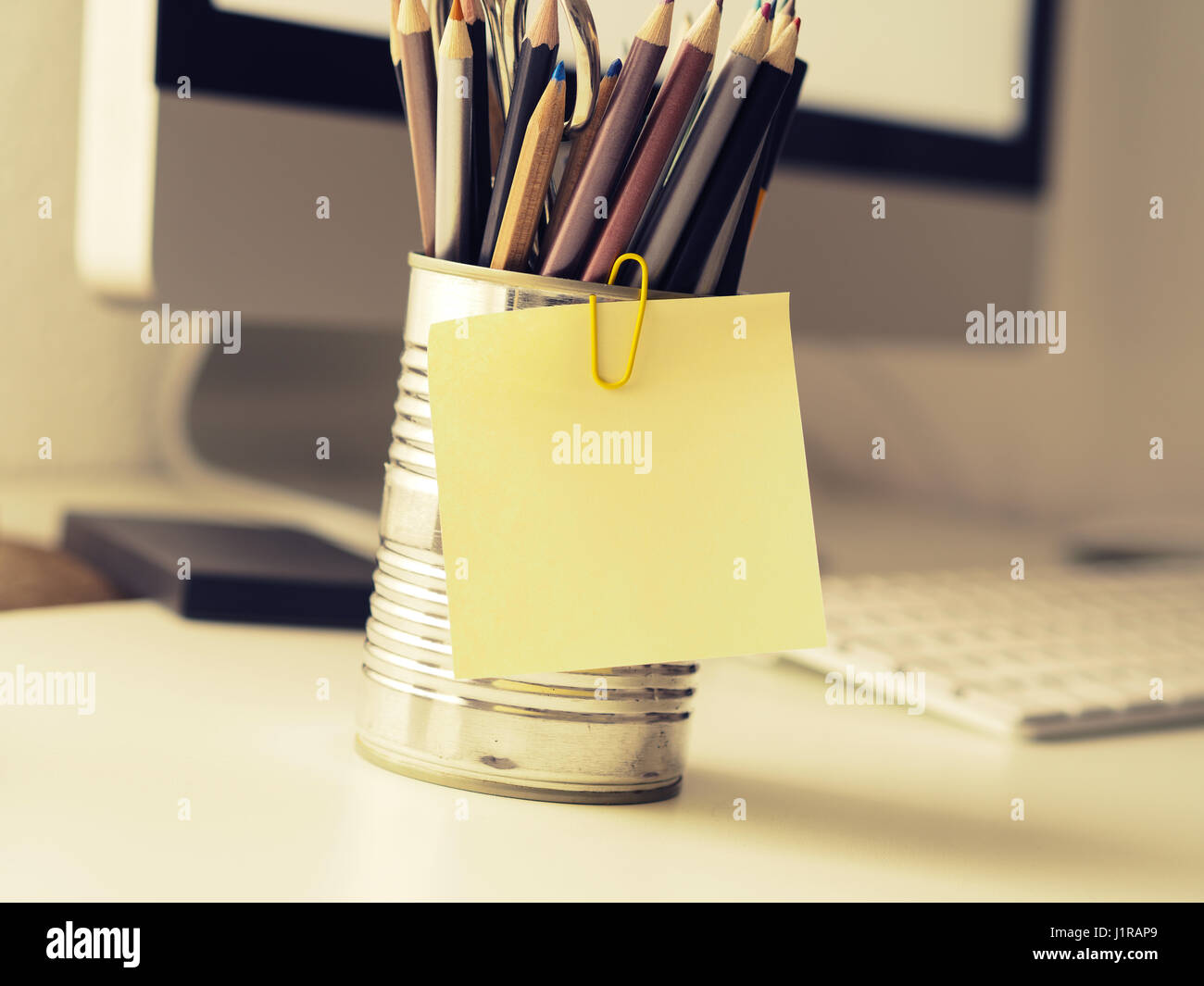 Sticky note close up on an office work space, selective focus retro ...