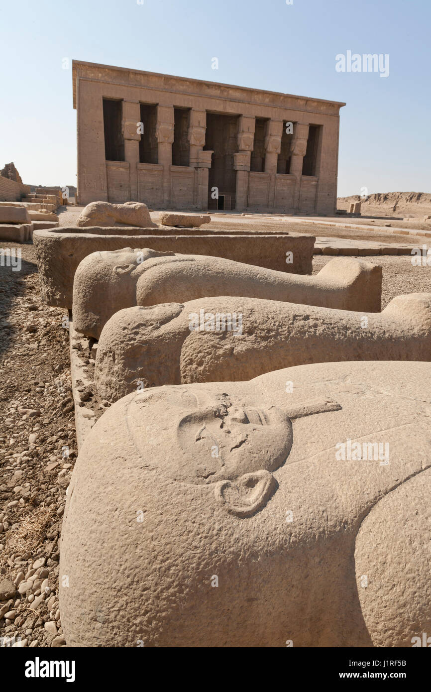 View of the Temple of Hathor at Dendera with several stone sarcophagi ...