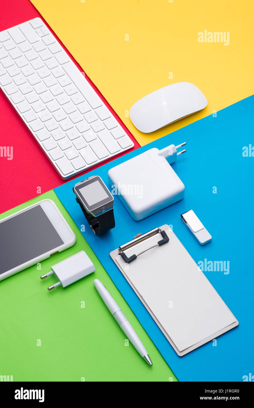 Well organised white office objects on colorful background Stock Photo ...