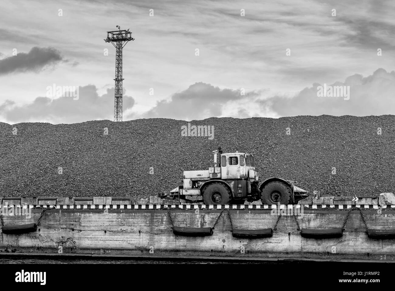 Tractor at coal hill Stock Photo - Alamy