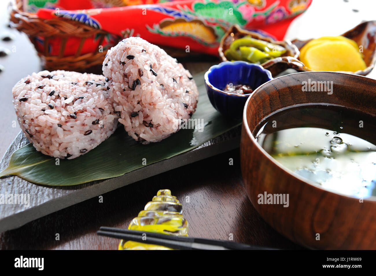 Japanese rice with soup on wooden platter onigiri Stock Photo - Alamy