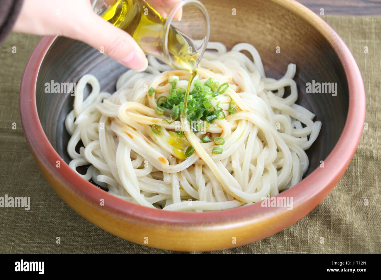 Ramen noodle with oil in bowl Stock Photo - Alamy