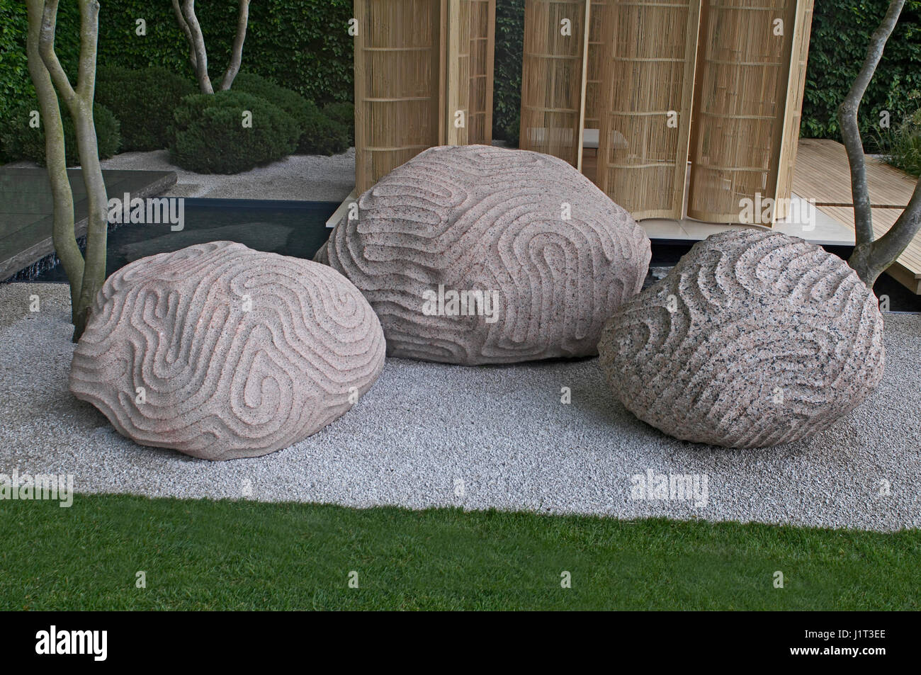 Sculpture showing the intervention of humans into nature in a garden ...