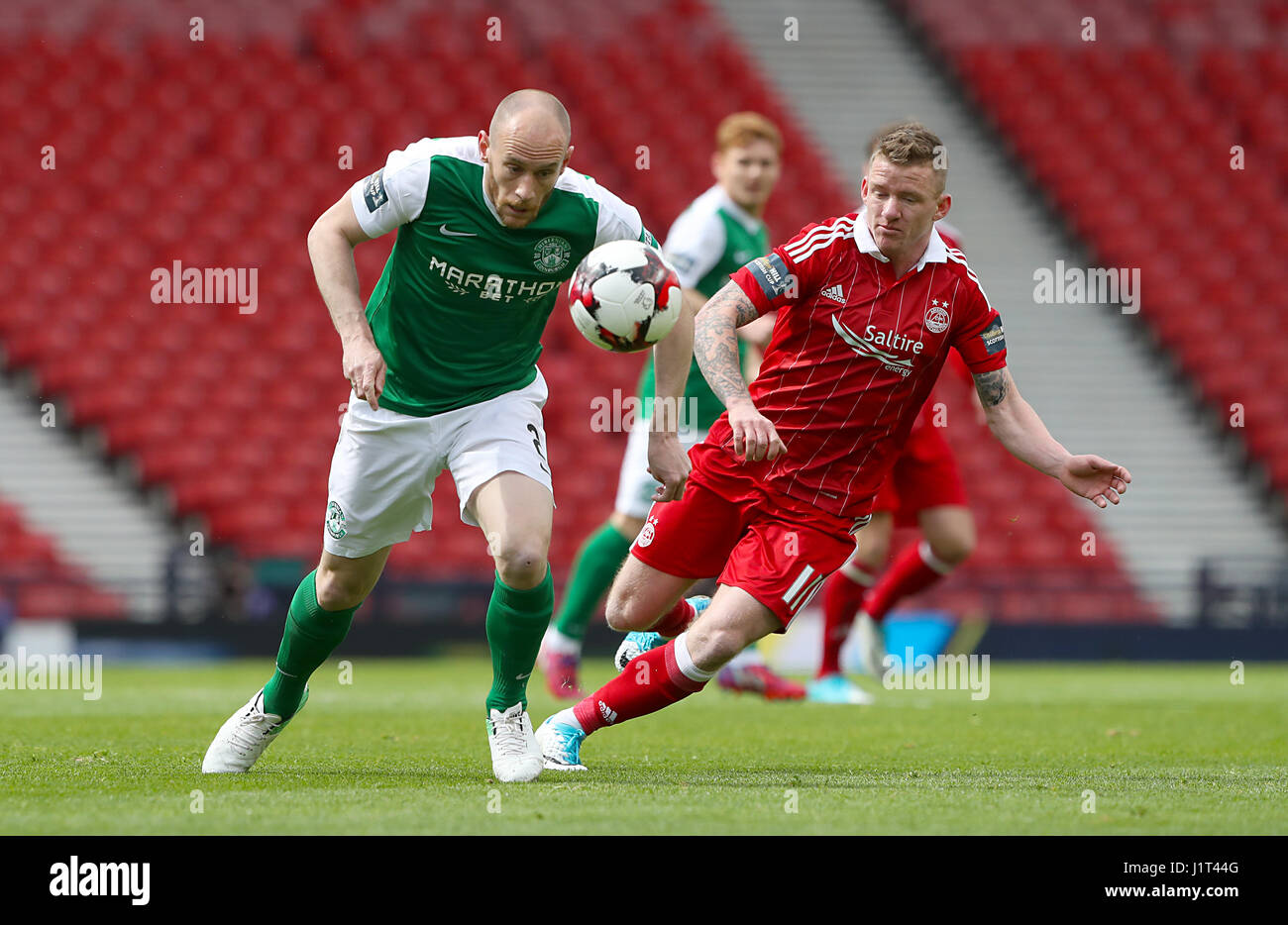 Hibernian's David Gray (left) and Aberdeen's Jonny Hayes battle for the ...