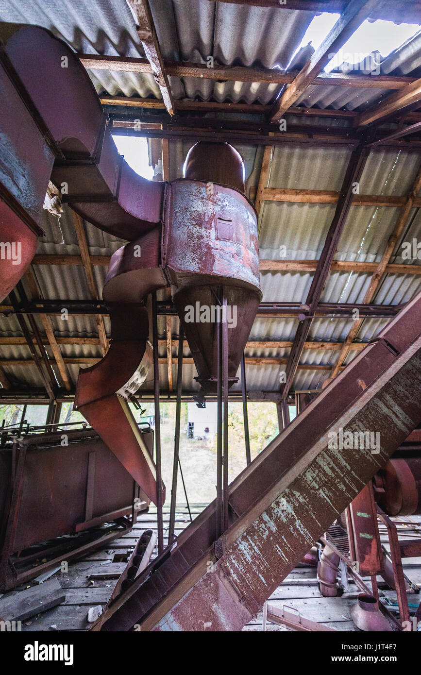 Machinery in grain elevator of abandoned kolkhoz near Zymovyshche ...