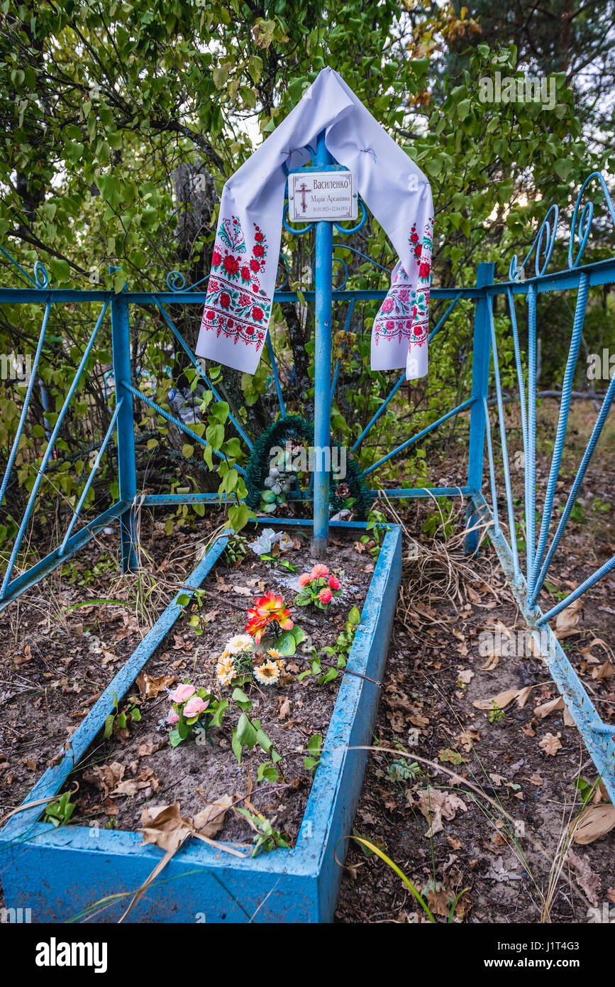 Grave on a cemetery in abandoned Zymovyshche village Chernobyl Nuclear ...