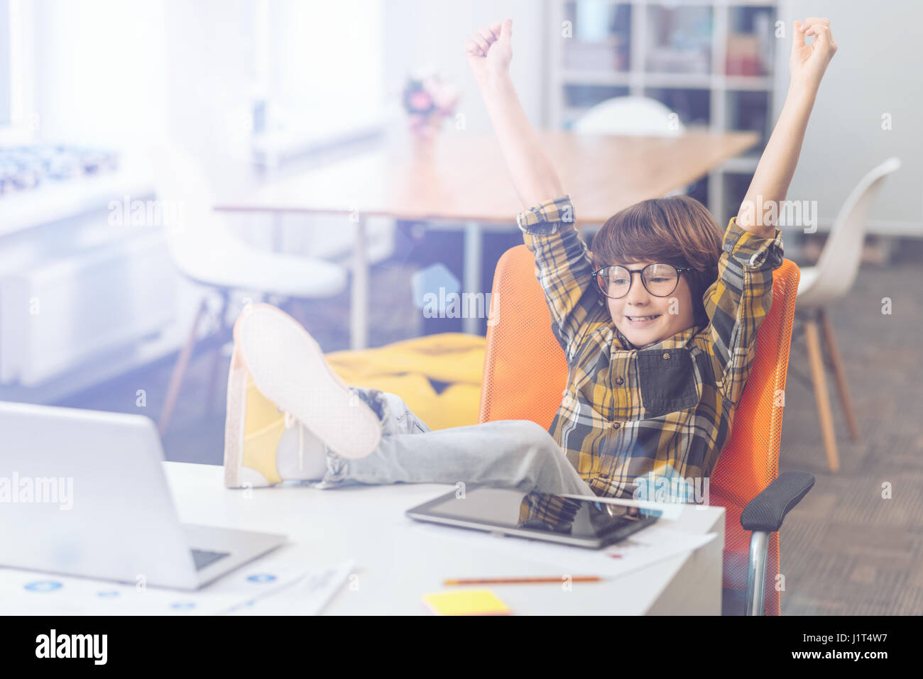Child school feet on desk hi-res stock photography and images - Alamy