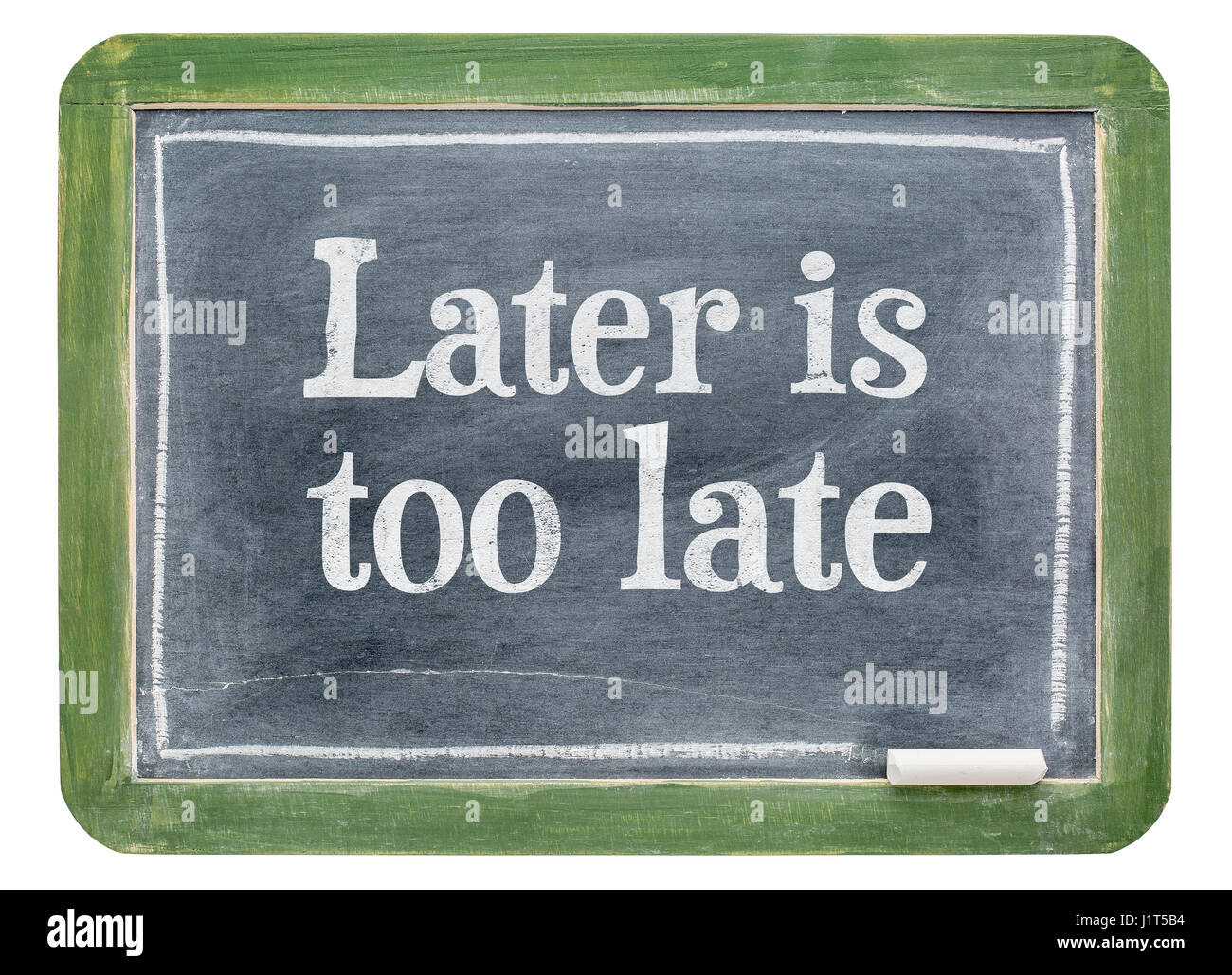 Later is too late - motivational text on a slate blackboard isolated on ...