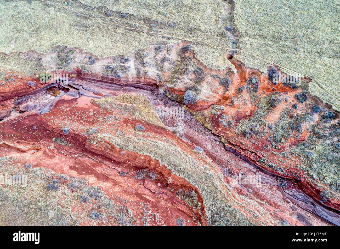 aerial landscape abstract of Colorado foothills with a dry stream ...