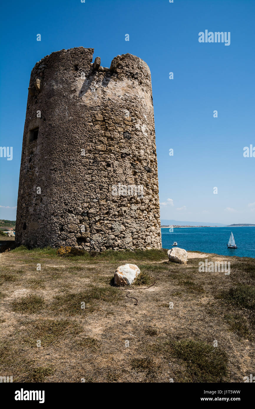 Old watchtower Torre del Sevo Turr’e Seu against bright, clear blue sky ...