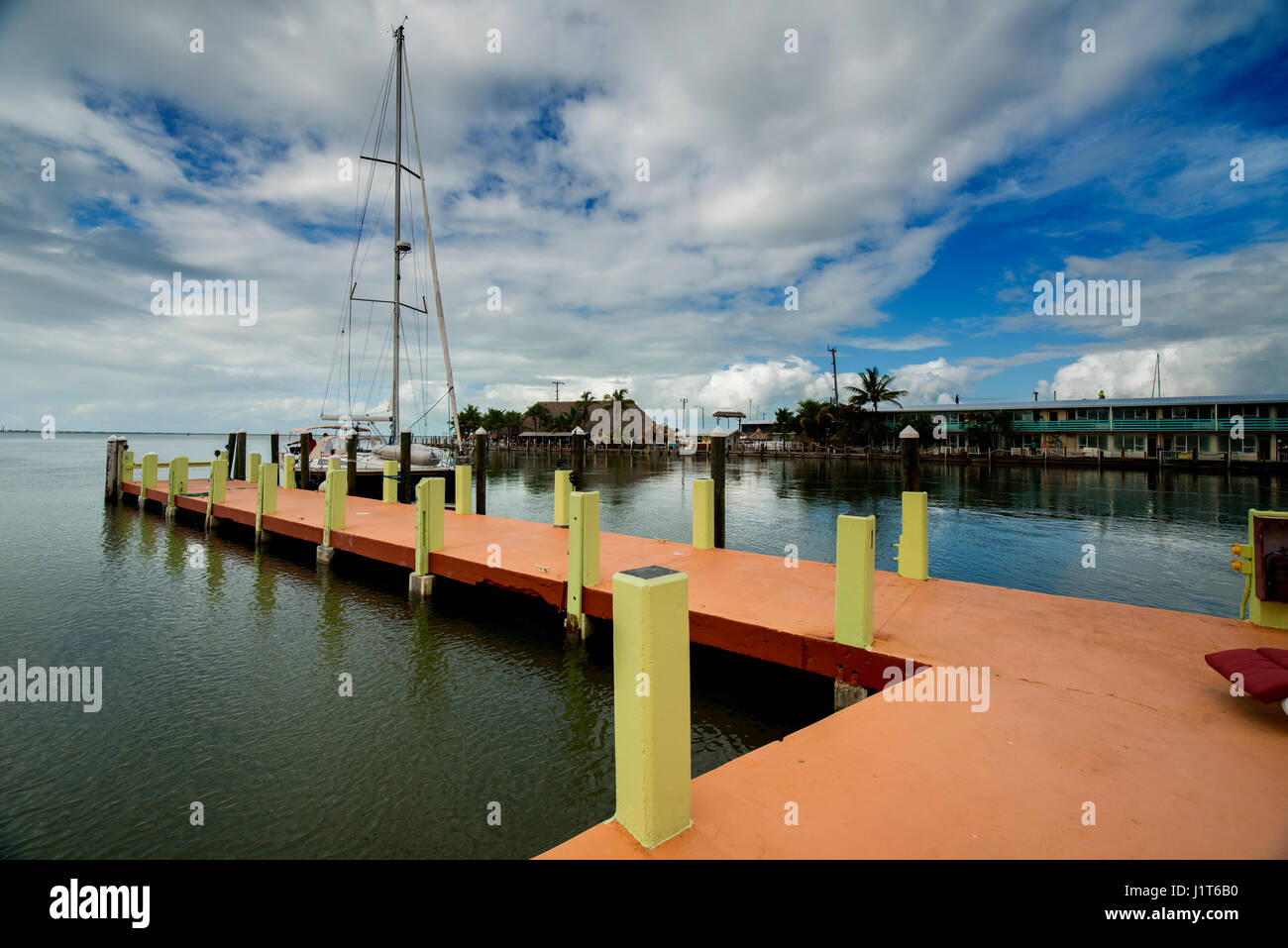 tropical dock to ocean Stock Photo - Alamy