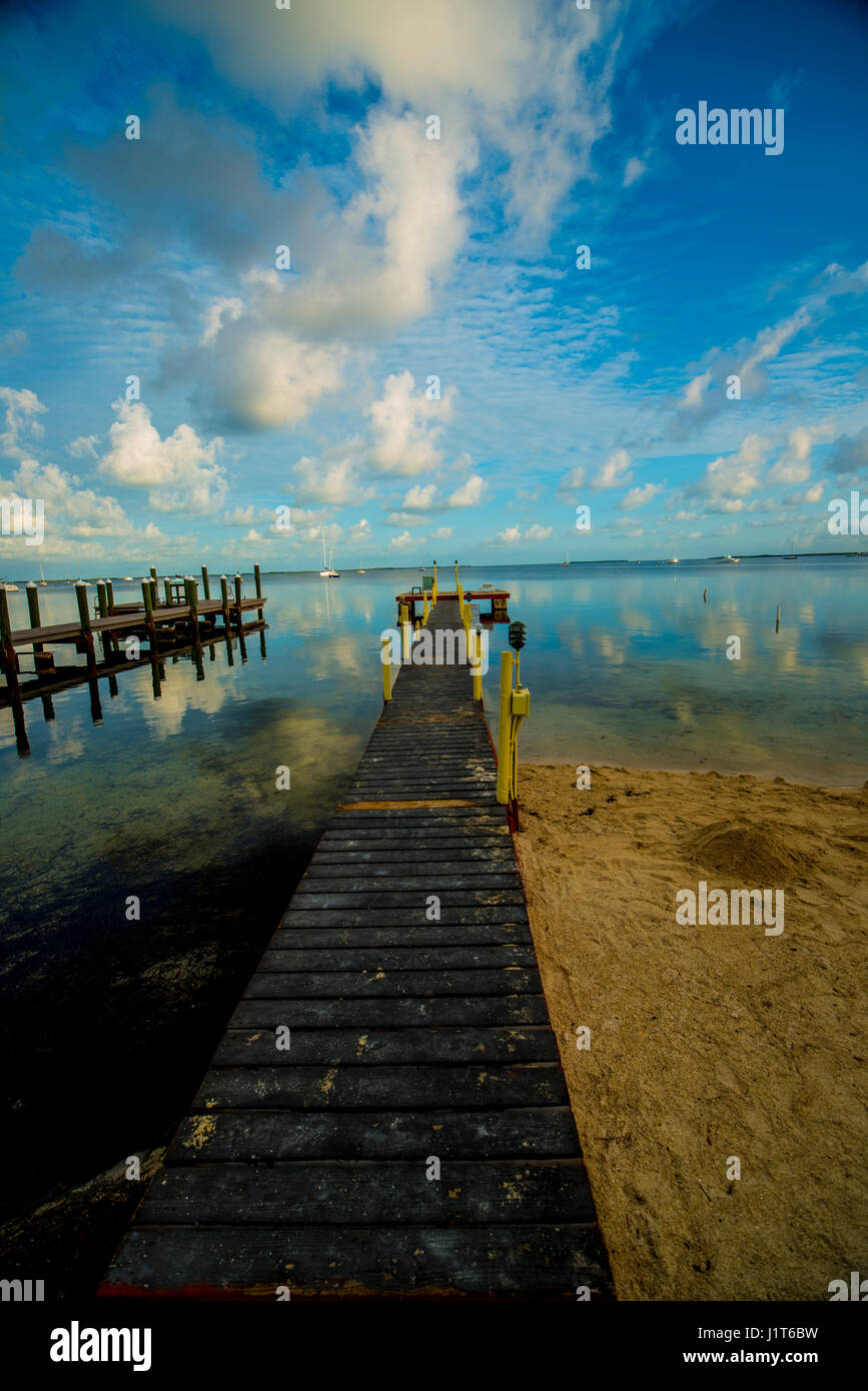 tropical dock to ocean Stock Photo - Alamy