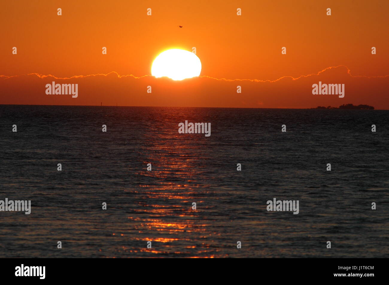 sunset over key largo bay Stock Photo - Alamy
