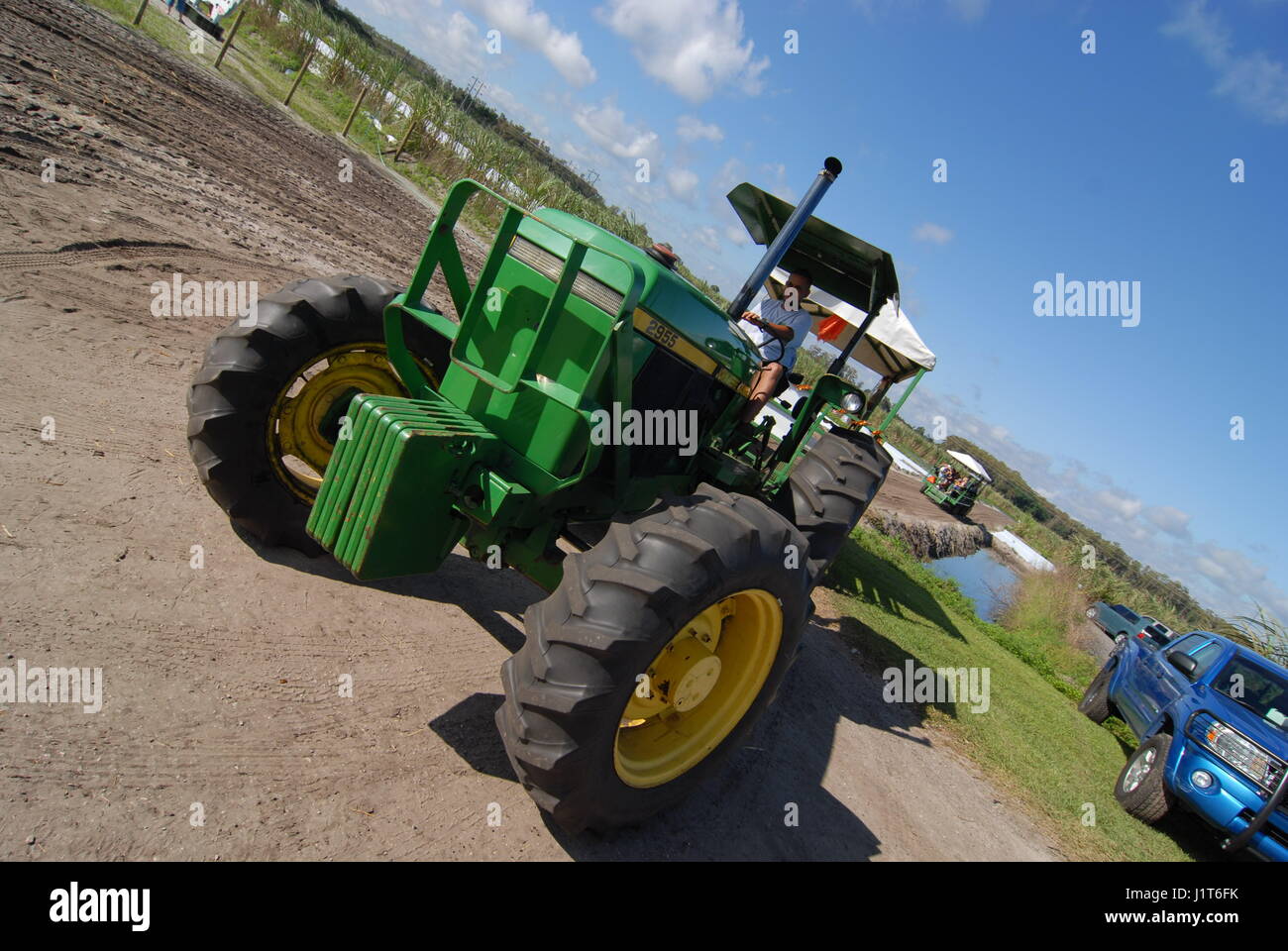families at a farm tractor event Stock Photo - Alamy
