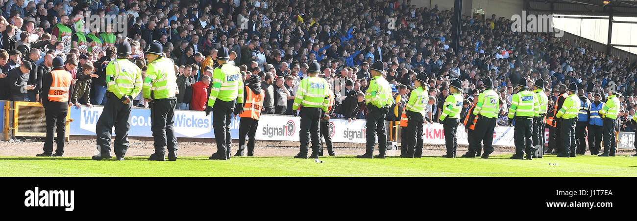 The police form a line after the pitch invasion during the Sky Bet ...
