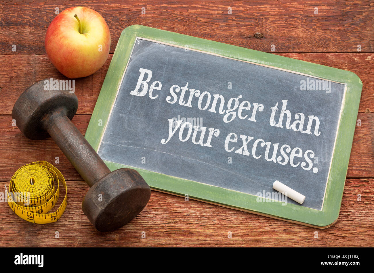 Be stronger than your excuses - fitness concept on a slate blackboard ...
