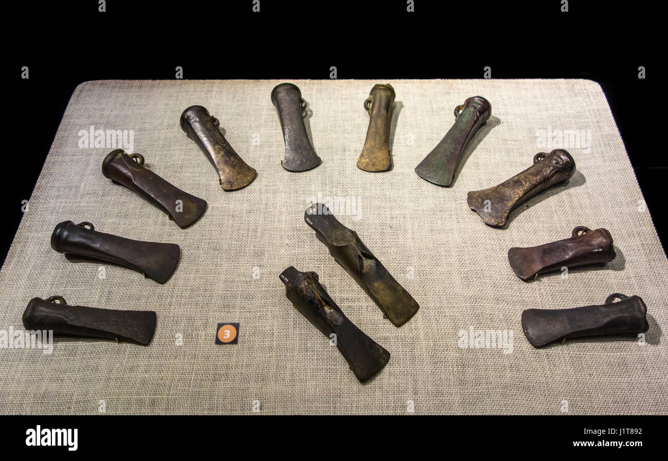 Collection of winged axes and bronze socketed axes, linear facetted axe ...