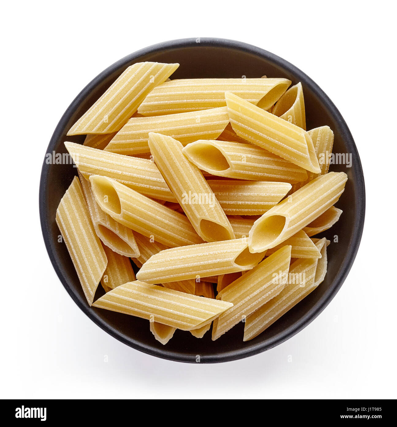 penne pasta in bowl, isolated on white background, top view Stock Photo ...
