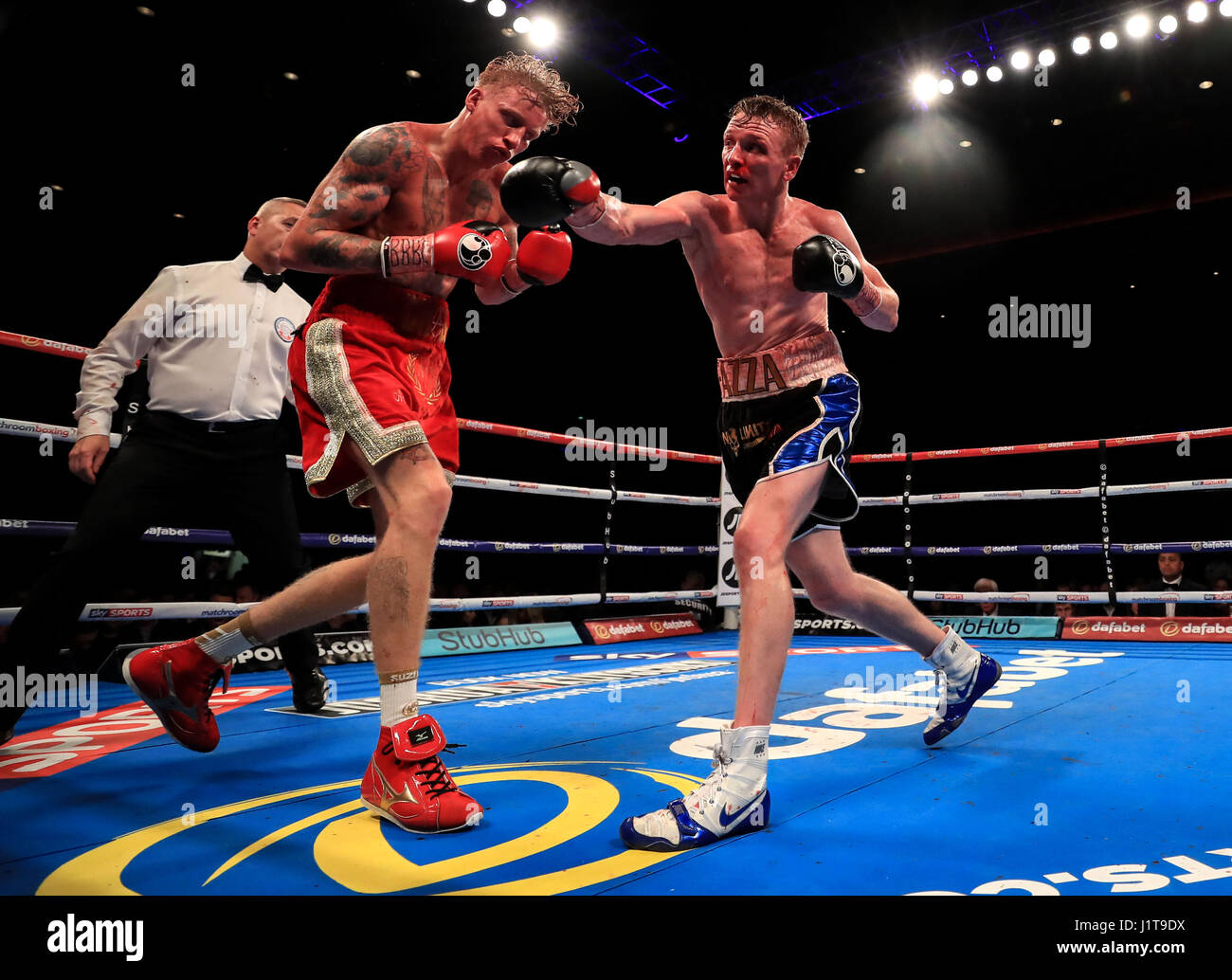 Tom Farrell (right) in action against Tommy Carus in a Super ...