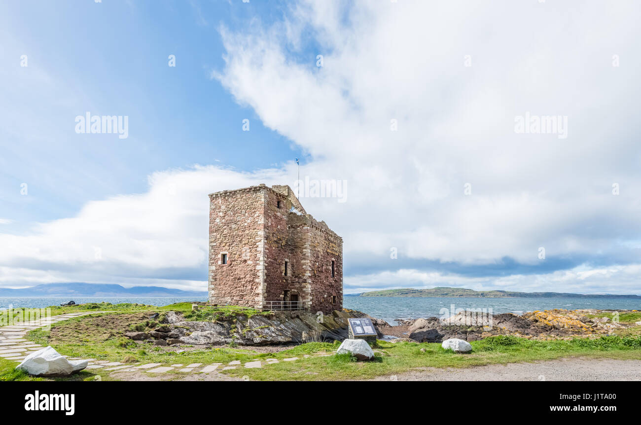 Portencross Castle on a clear day with blue sky's and the Cmbrae's and ...