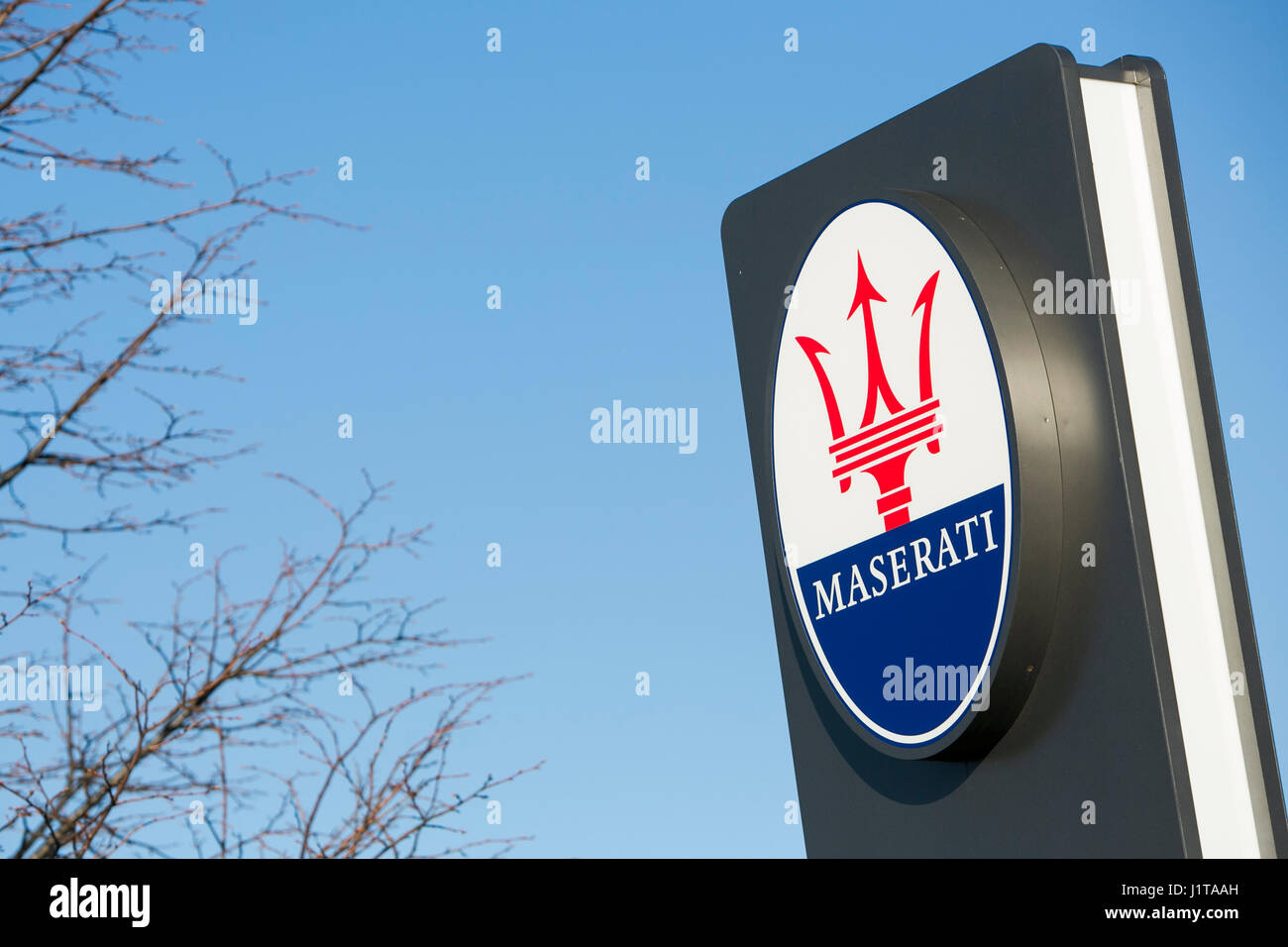 A logo sign outside of a Maserati car dealership in Oakville, ON ...