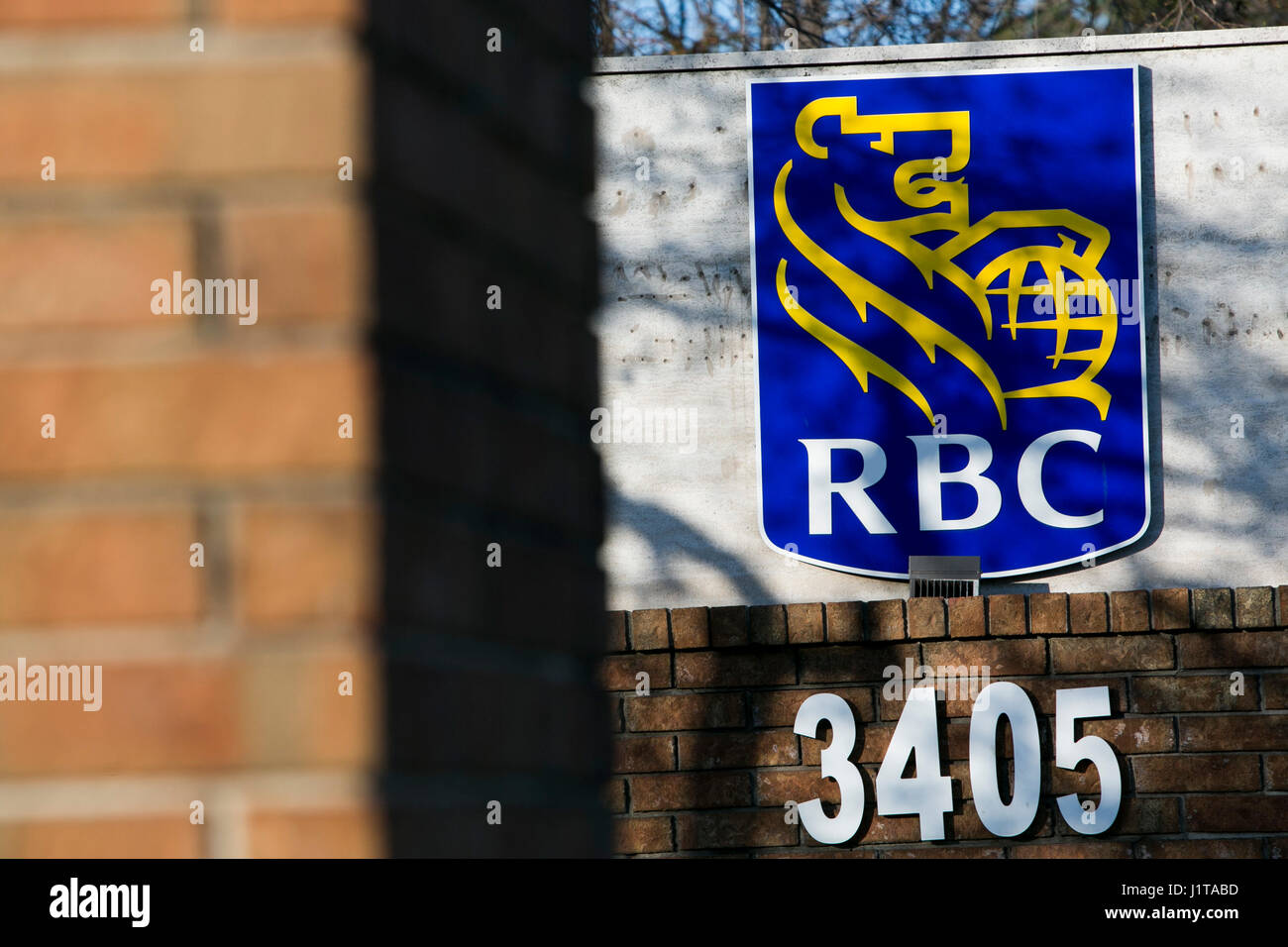 A logo sign outside a facility occupied by the Royal Bank of Canada ...