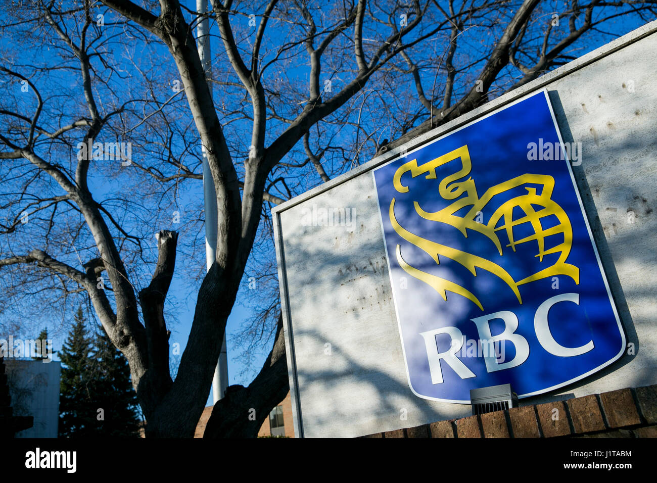 A logo sign outside a facility occupied by the Royal Bank of Canada ...