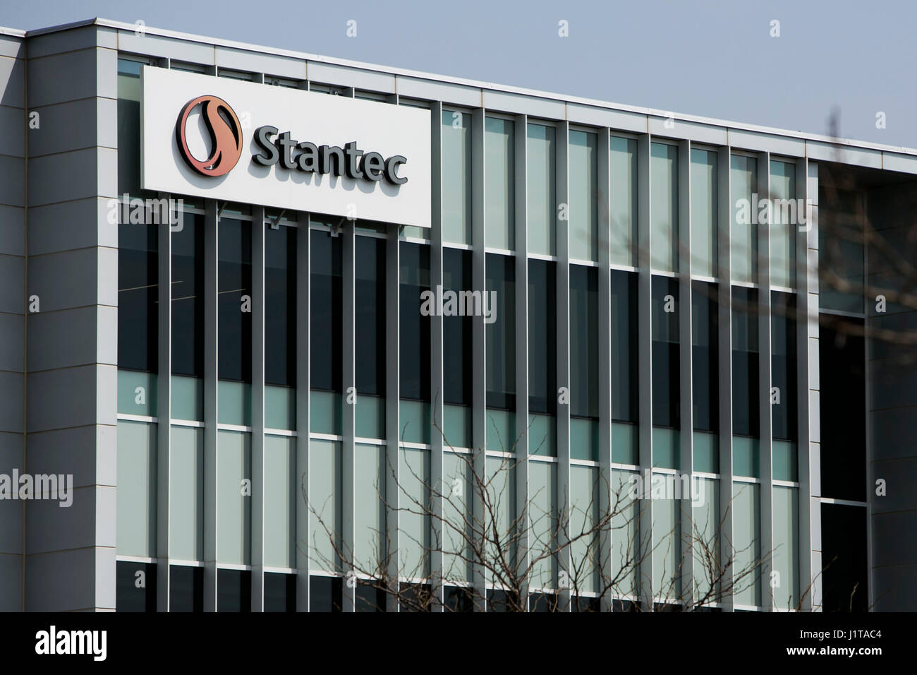 A logo sign outside of a facility occupied by Stantec in Waterloo ...