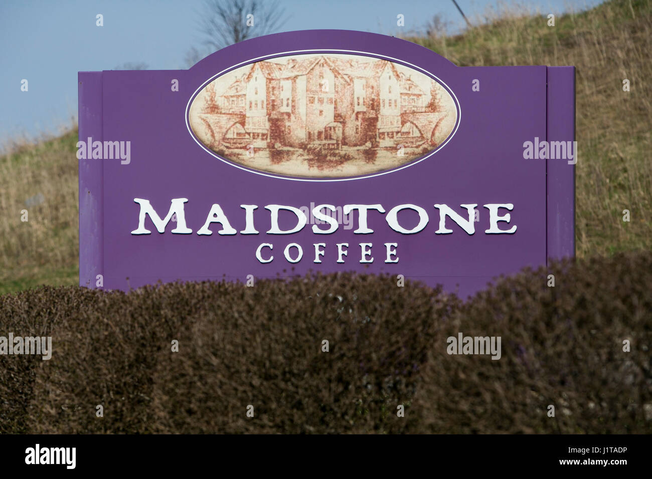 A logo sign outside of a facility occupied by Maidstone Coffee in ...