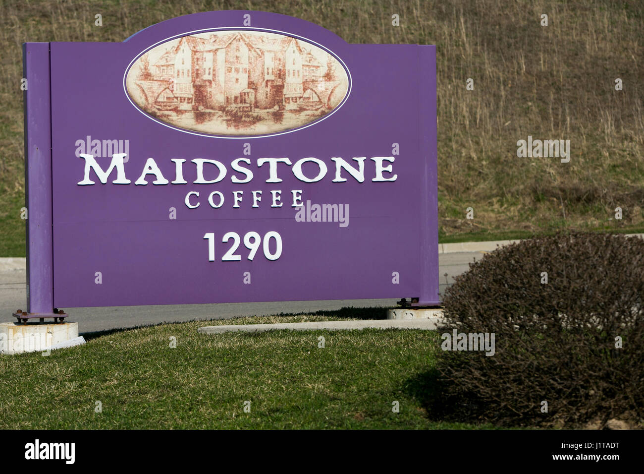 A logo sign outside of a facility occupied by Maidstone Coffee in ...