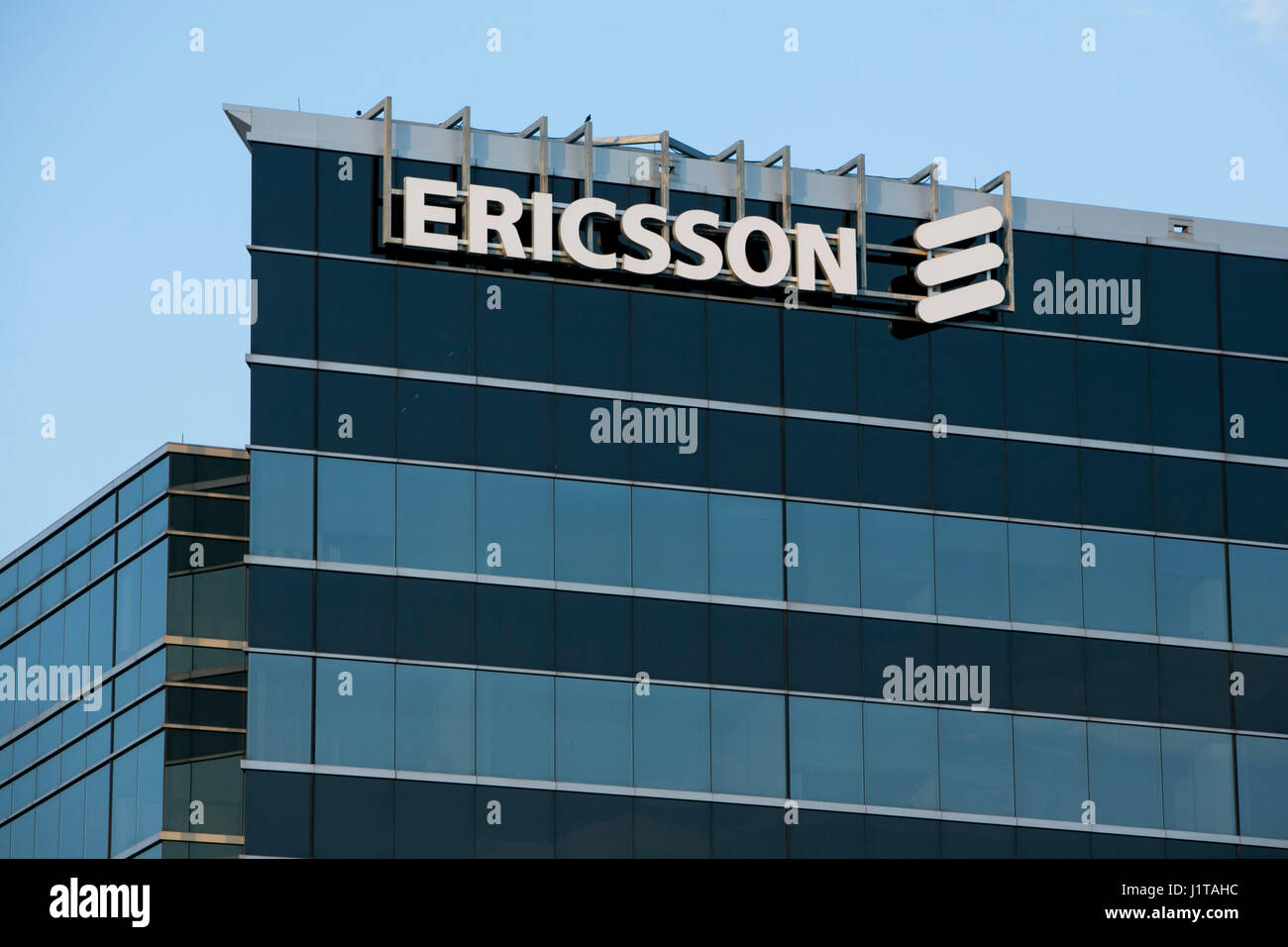 A logo sign outside of a facility occupied Ericsson in Mississauga ...