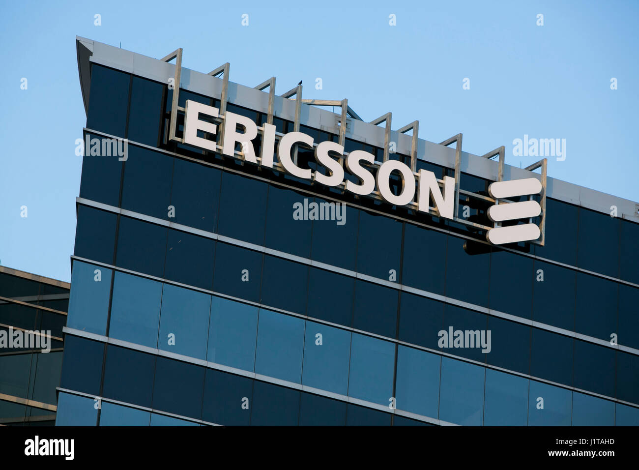 A logo sign outside of a facility occupied Ericsson in Mississauga ...