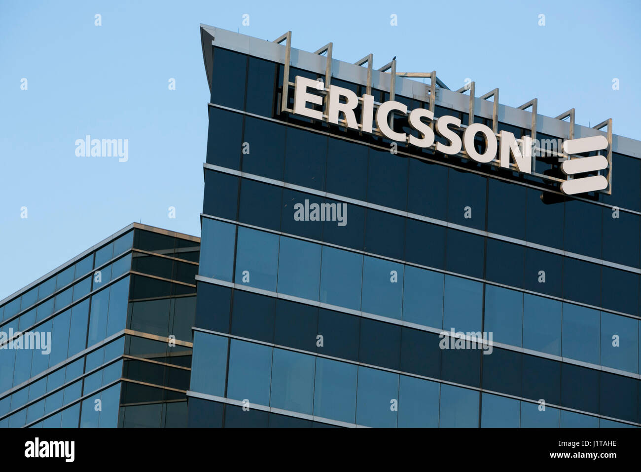 A logo sign outside of a facility occupied Ericsson in Mississauga ...