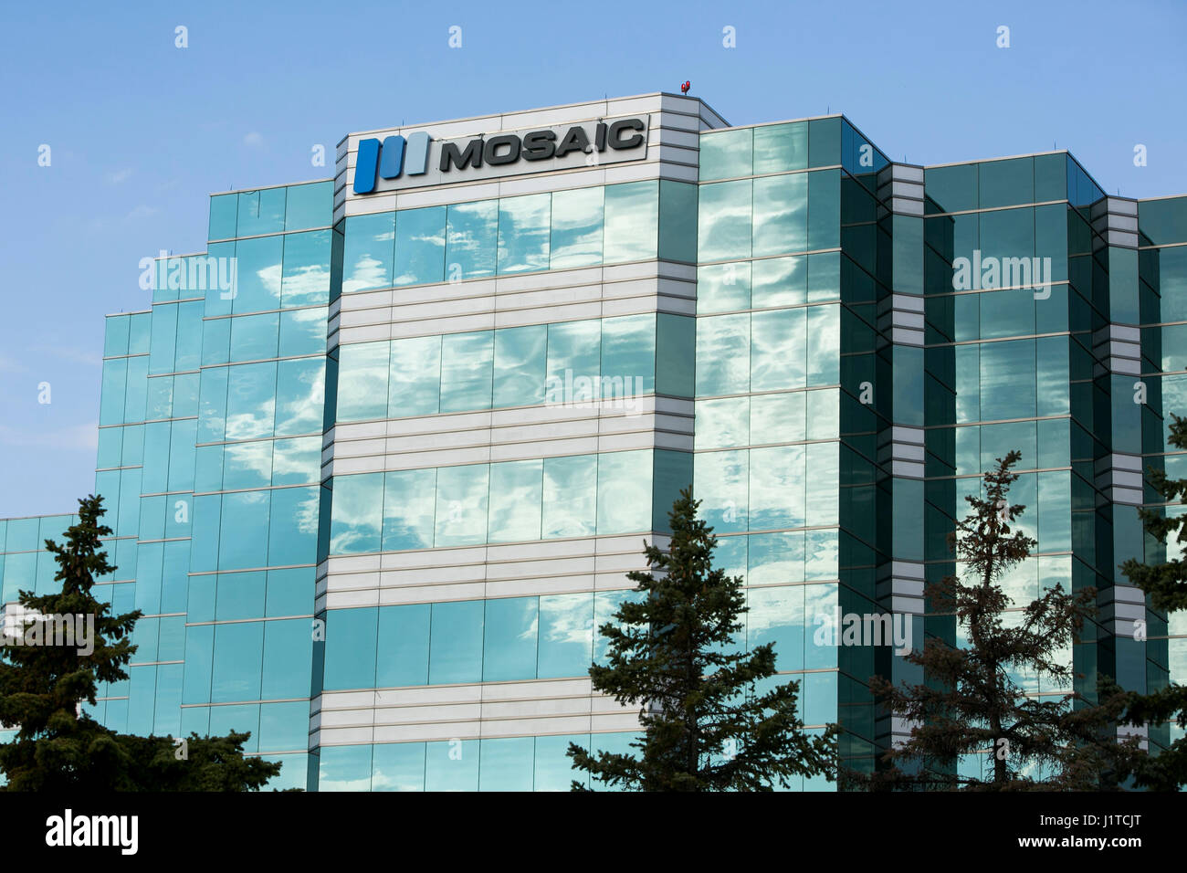 A logo sign outside of a facility occupied by Mosaic Sales Solutions in ...