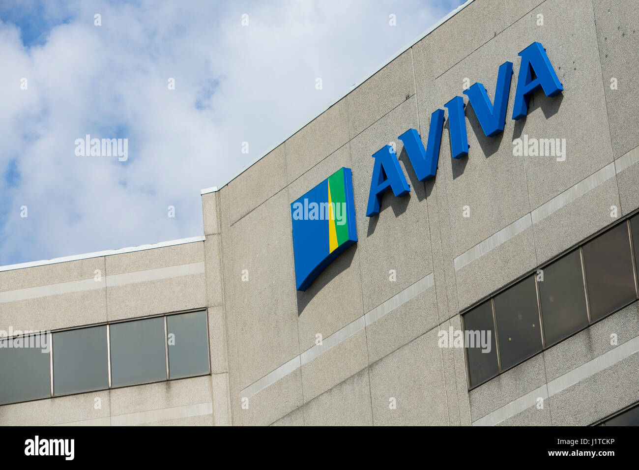 A logo sign outside of a facility occupied by Aviva in Mississauga ...