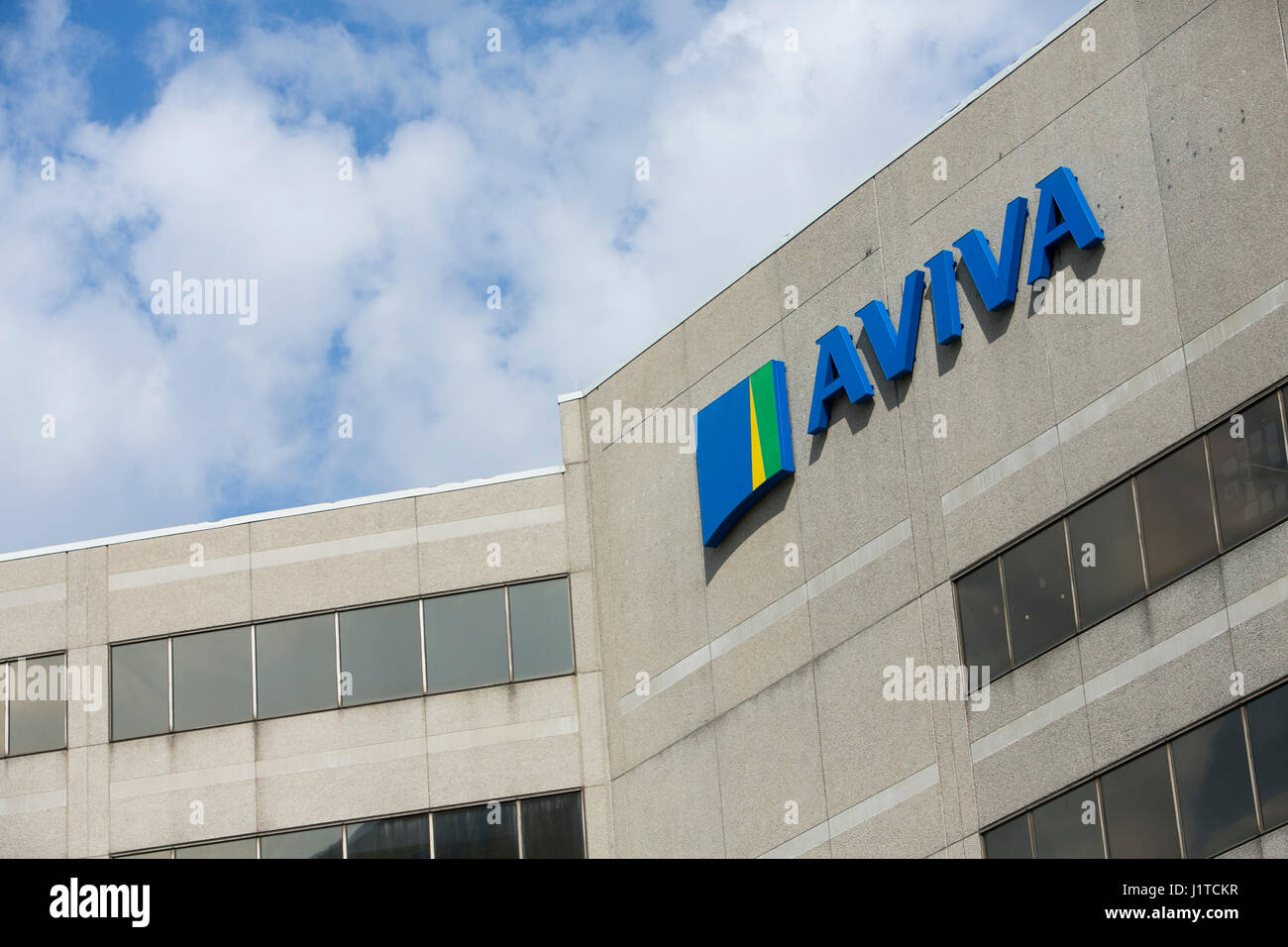 A logo sign outside of a facility occupied by Aviva in Mississauga ...