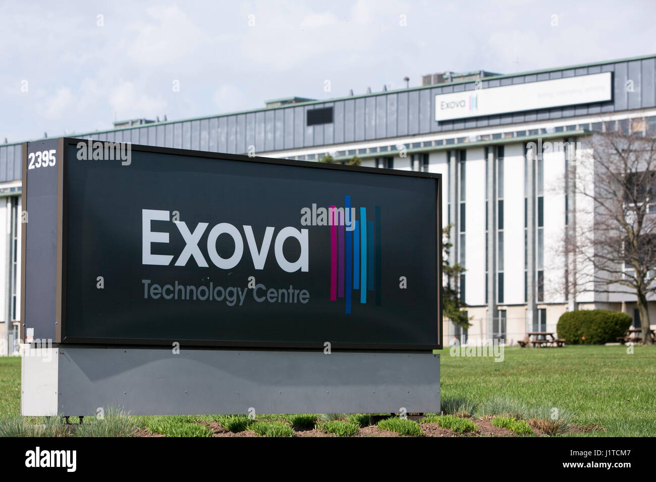 A logo sign outside of facility occupied by the Exova Group in ...