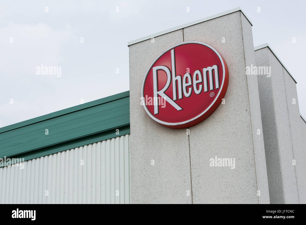 A logo sign outside of a facility occupied by the Rheem Manufacturing ...