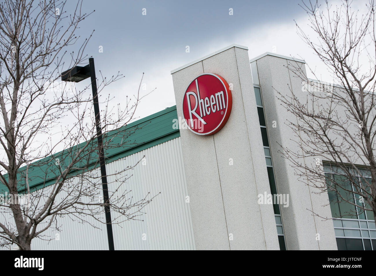 A logo sign outside of a facility occupied by the Rheem Manufacturing ...