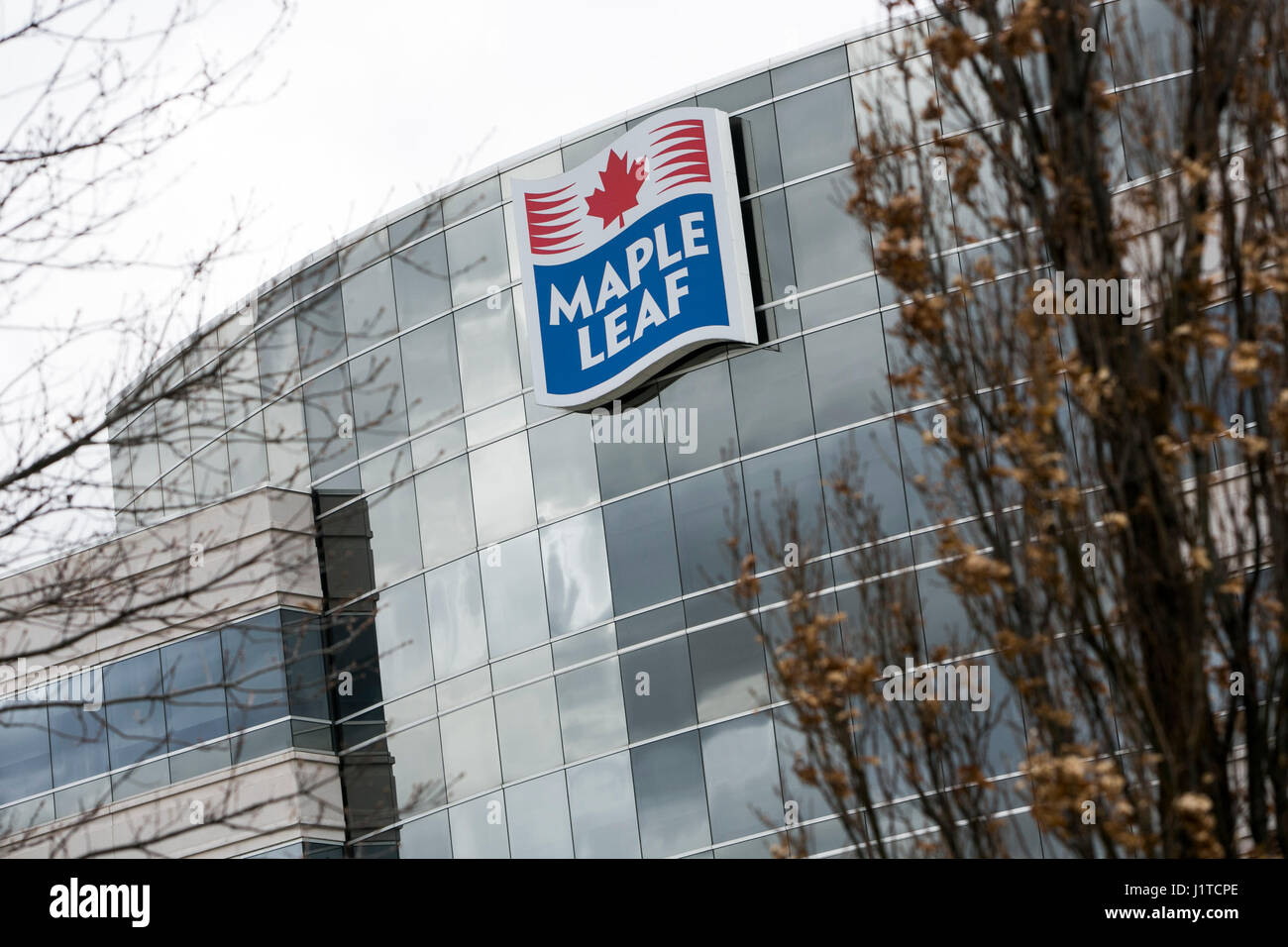 A logo sign outside of a facility occupied by Maple Leaf Foods Inc., in ...