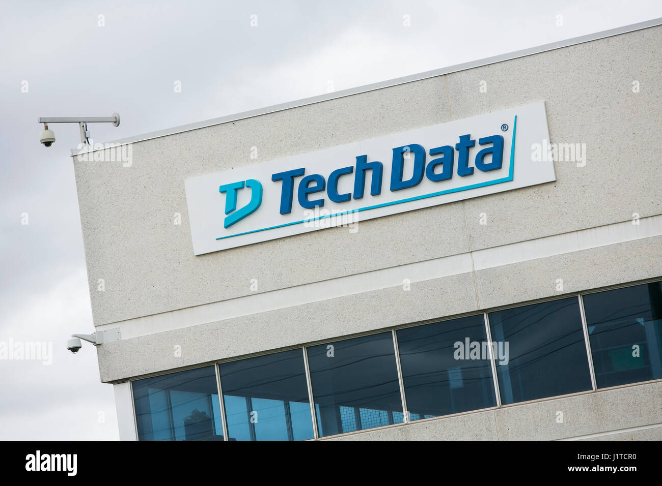 A logo sign outside of a facility occupied by the Tech Data Corporation ...