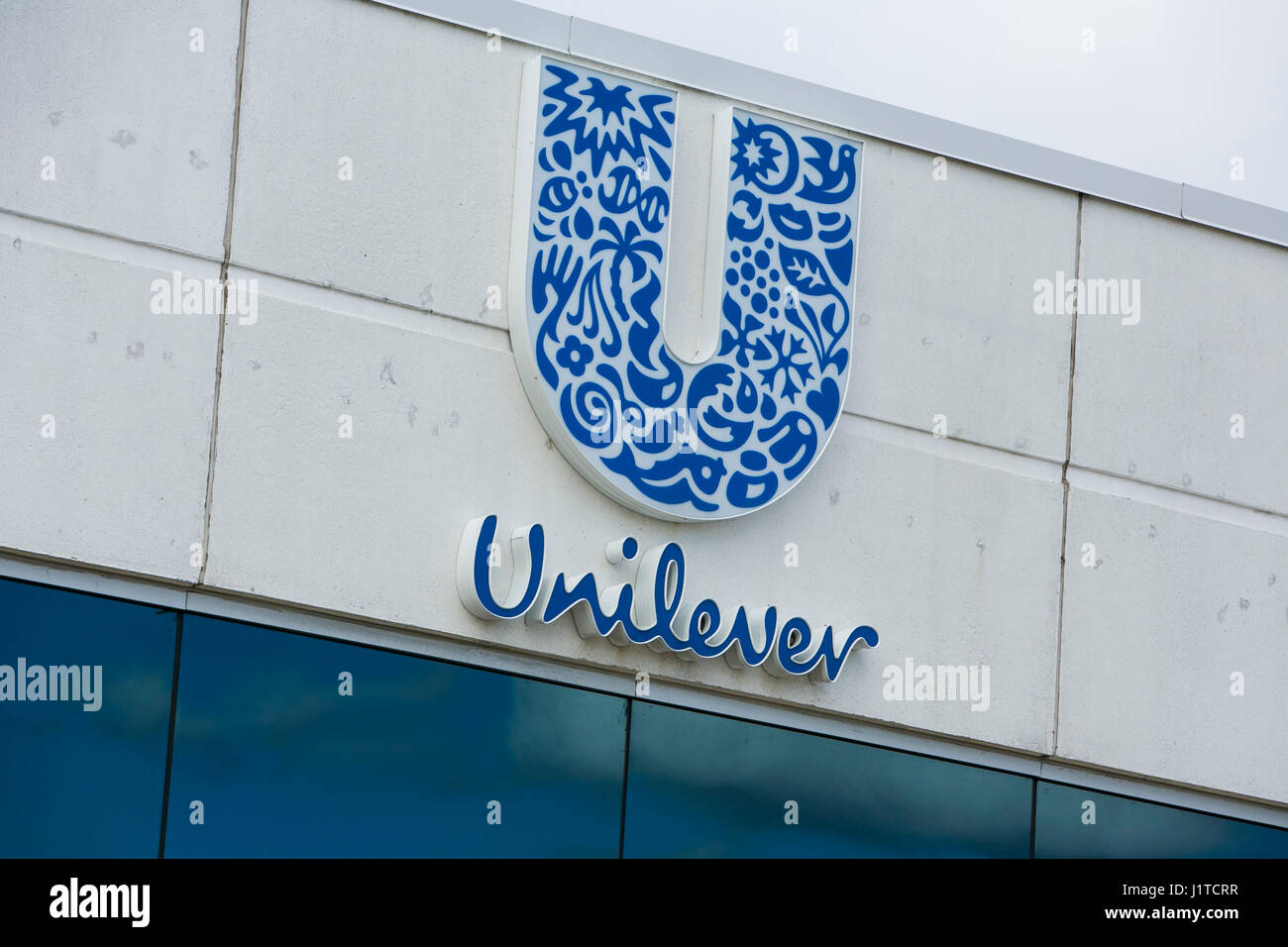 A logo sign outside of a facility occupied by Unilever in Mississauga ...