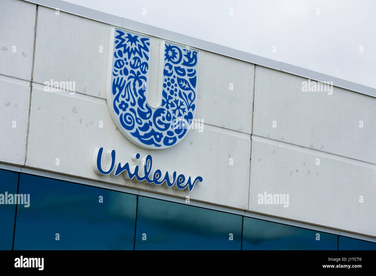 A logo sign outside of a facility occupied by Unilever in Mississauga ...