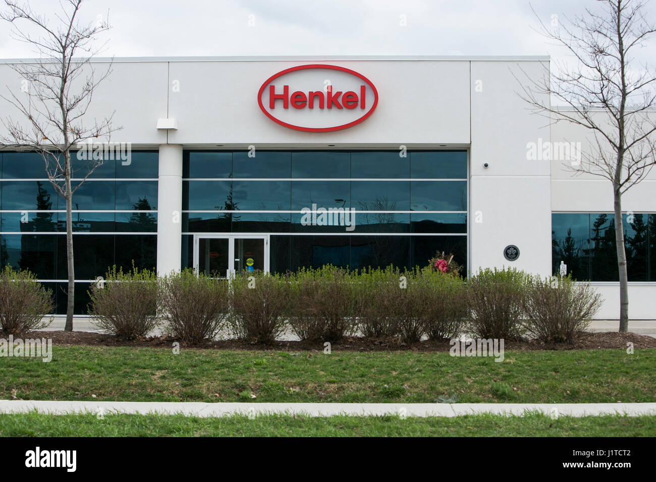 A logo sign outside of a facility occupied by Henkel AG & Company in ...