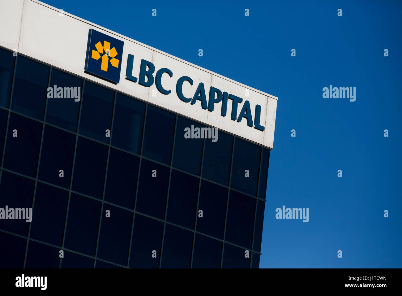 A logo sign outside of the headquarters of LBC Capital in Burlington ...