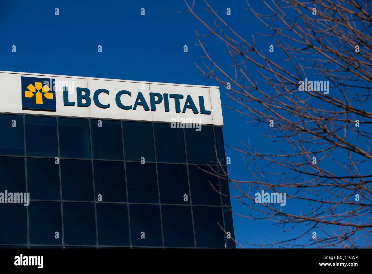 A logo sign outside of the headquarters of LBC Capital in Burlington ...