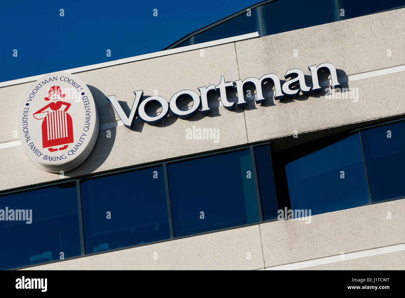 A logo sign outside of the headquarters of Voortman Cookies Limited in ...