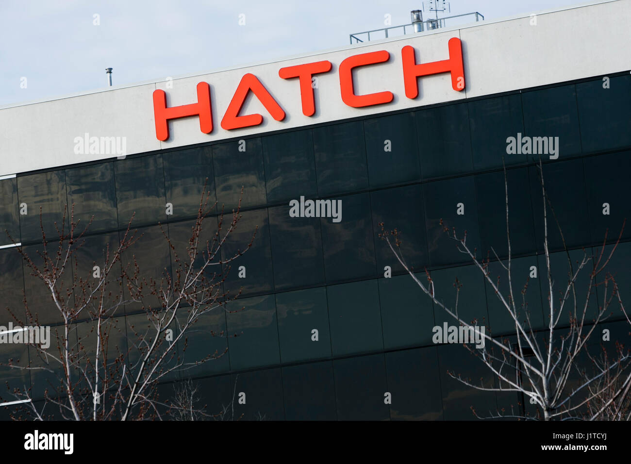 A logo sign outside of the headquarters of Hatch in Mississauga ...