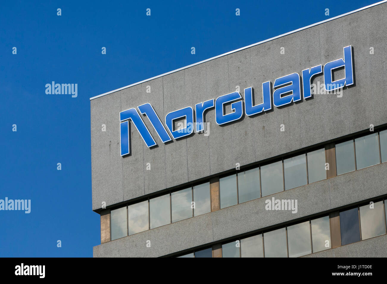 A logo sign outside of the headquarters of the Morguard Corporation in ...